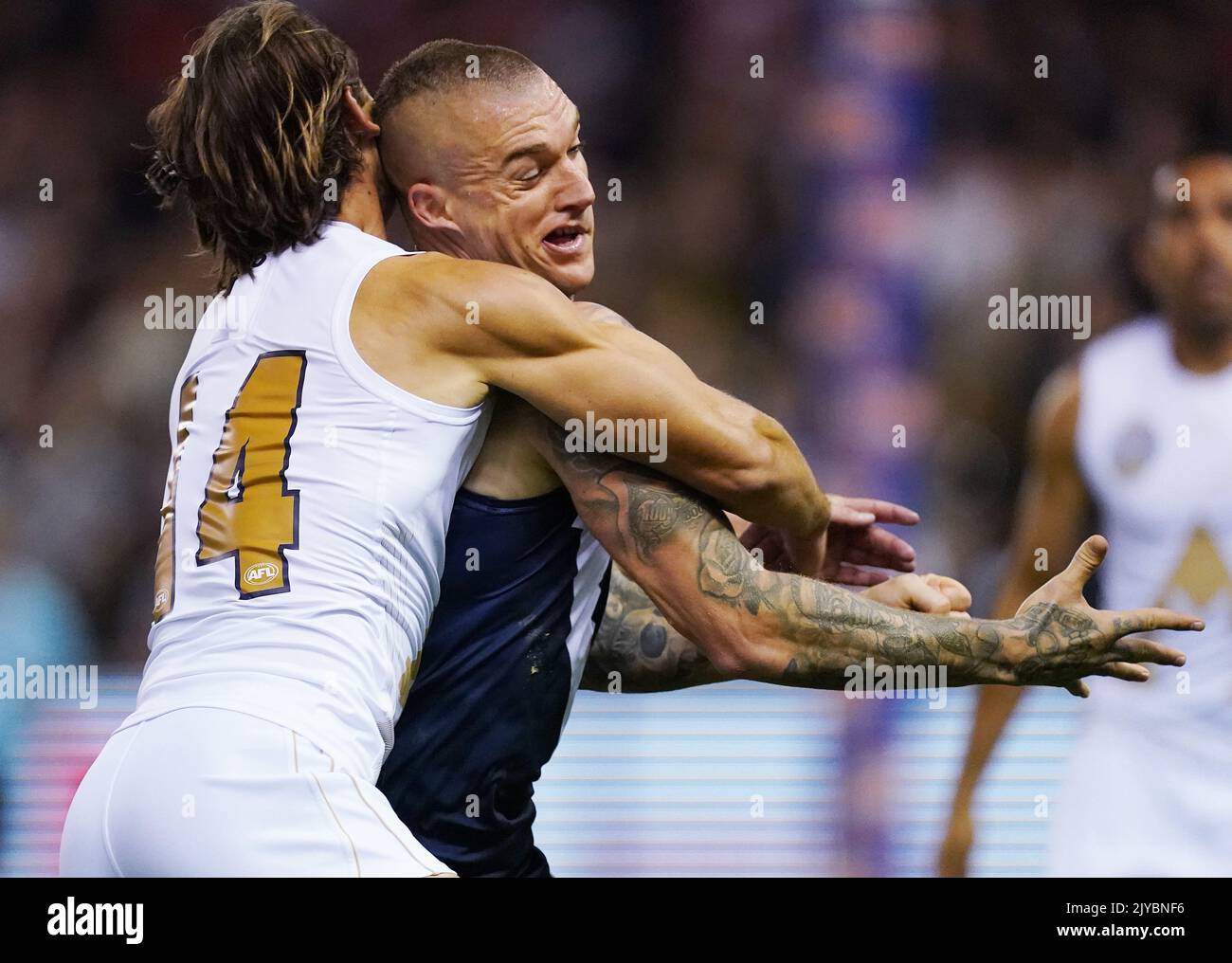 Lachie Weller of the Allstars tackles Dustin Martin of Victoria during ...