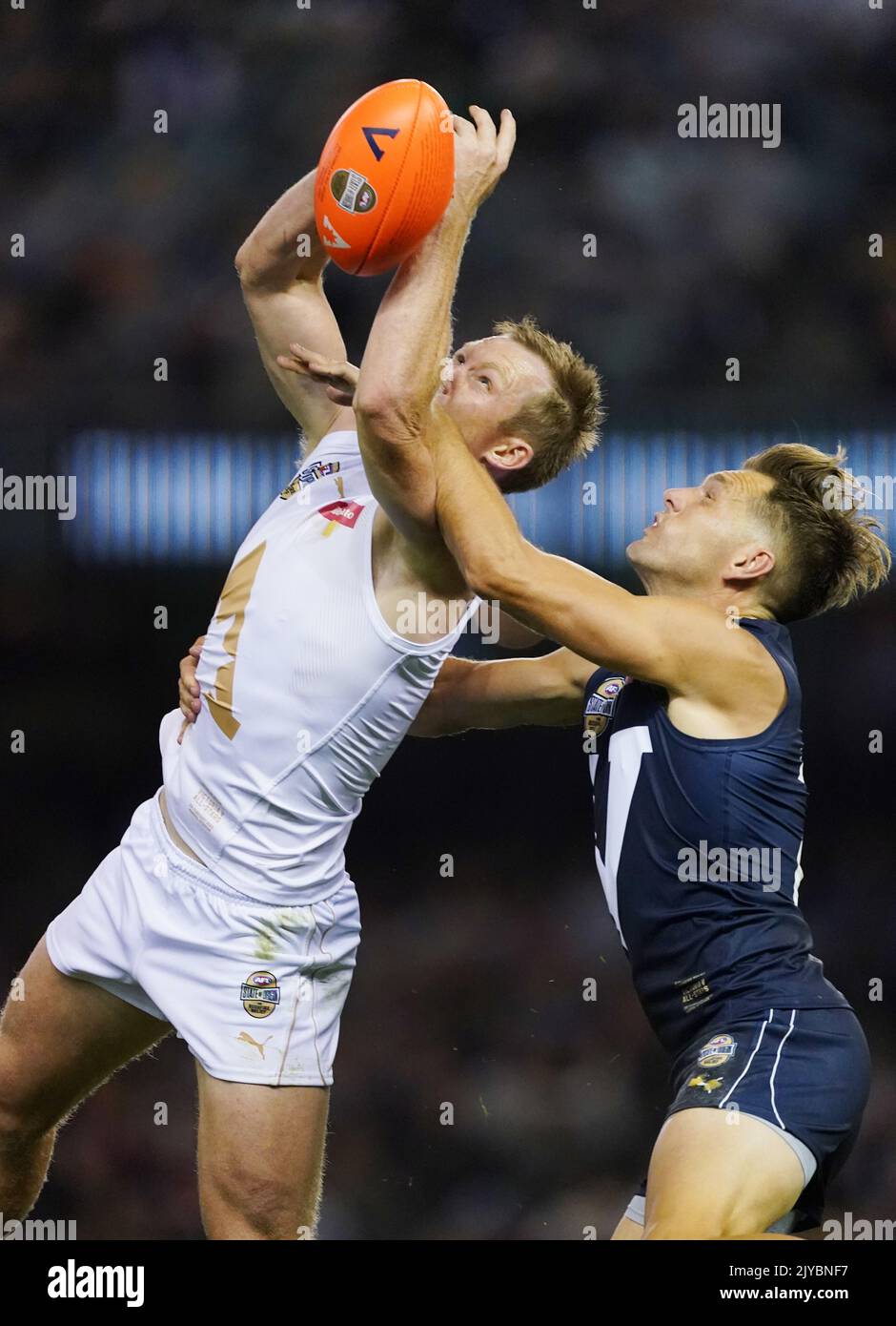 Jack Riewoldt of the Allstars competes for the ball against Shaun ...