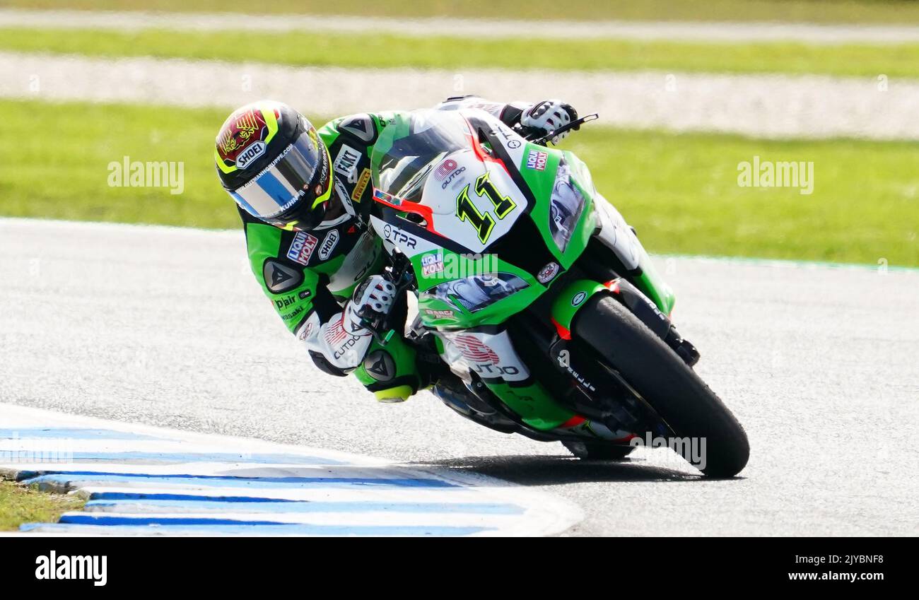 Sandro Cortese of Germany rides the #11 OUTDO Kawasaki TPR during a ...