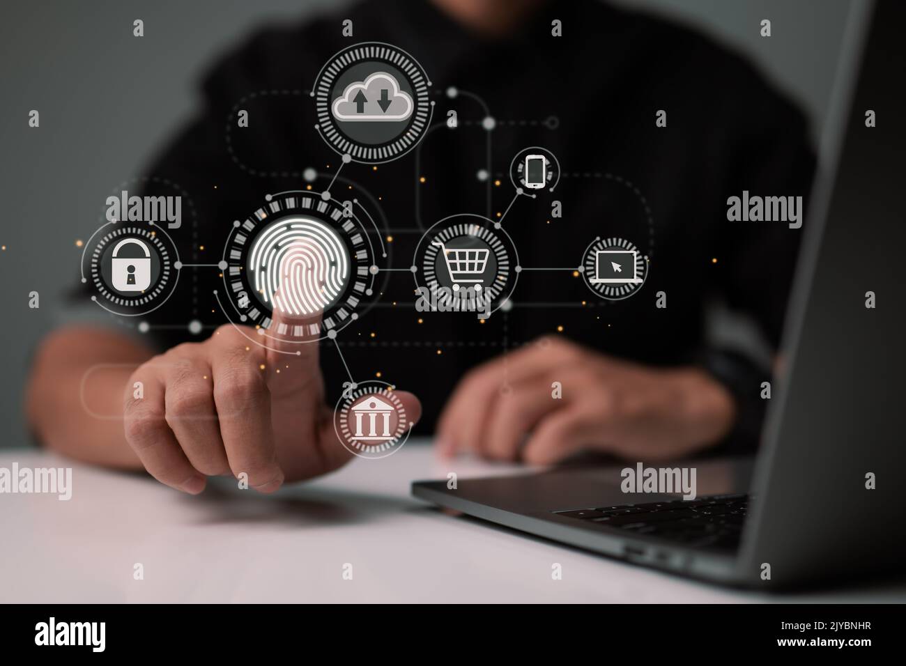 On a virtual display, a businessman's fingerprint scan provides a ...