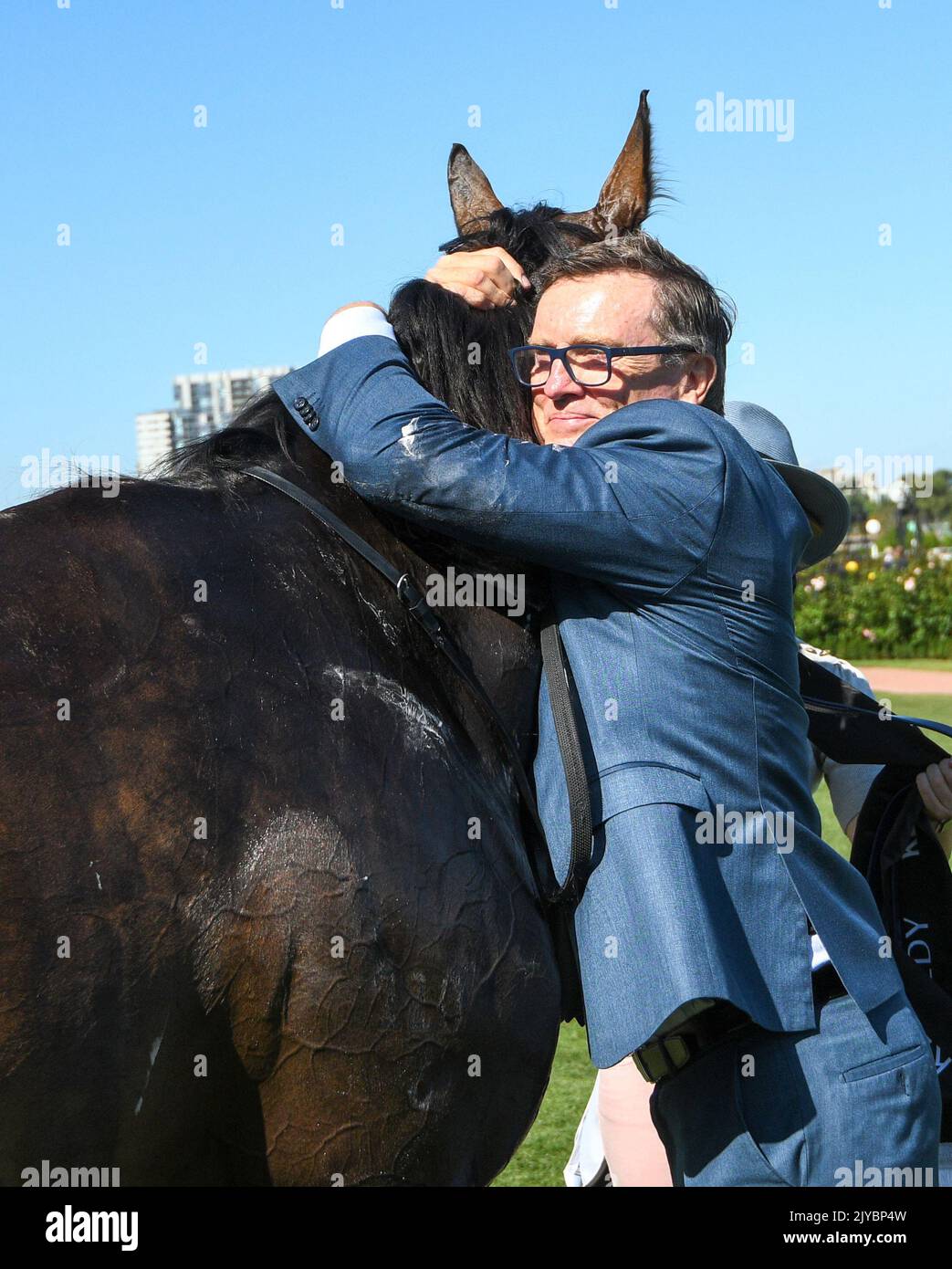 Trainer David Vandyke hugs Alligator Blood after victory in race 7, the ...