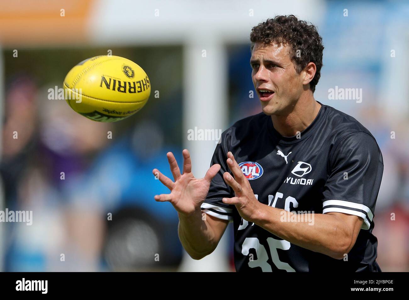 Ed Curnow of the Blues is seen warming up before the AFL Marsh ...