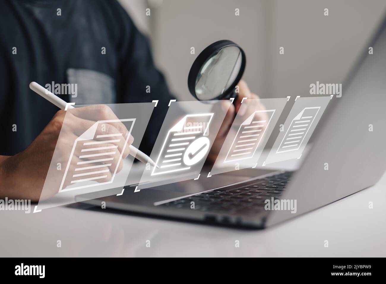 hand using a laptop computer with a virtual screen and document for ...