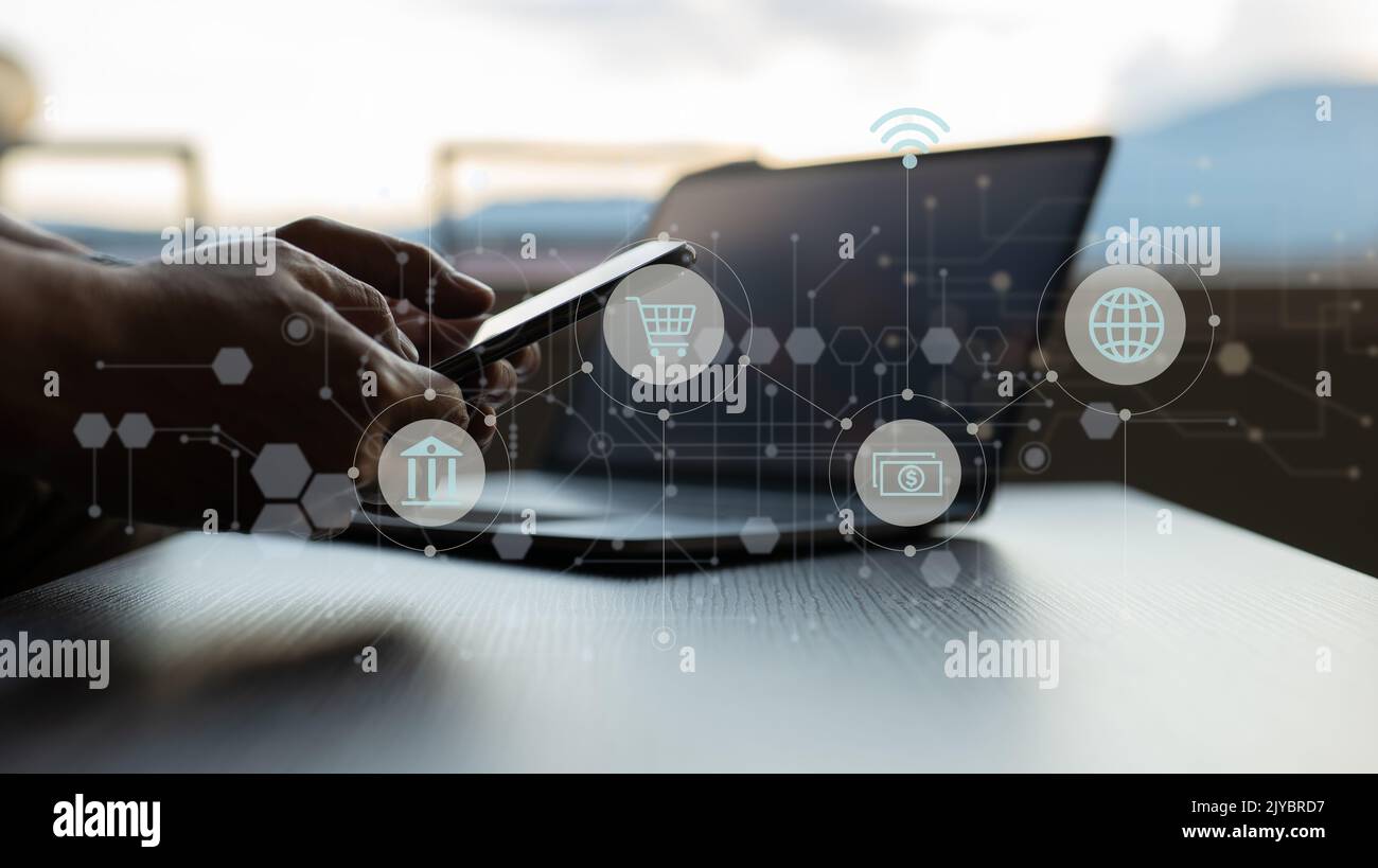 A man makes a payment via mobile online banking. Mobile banking network ...