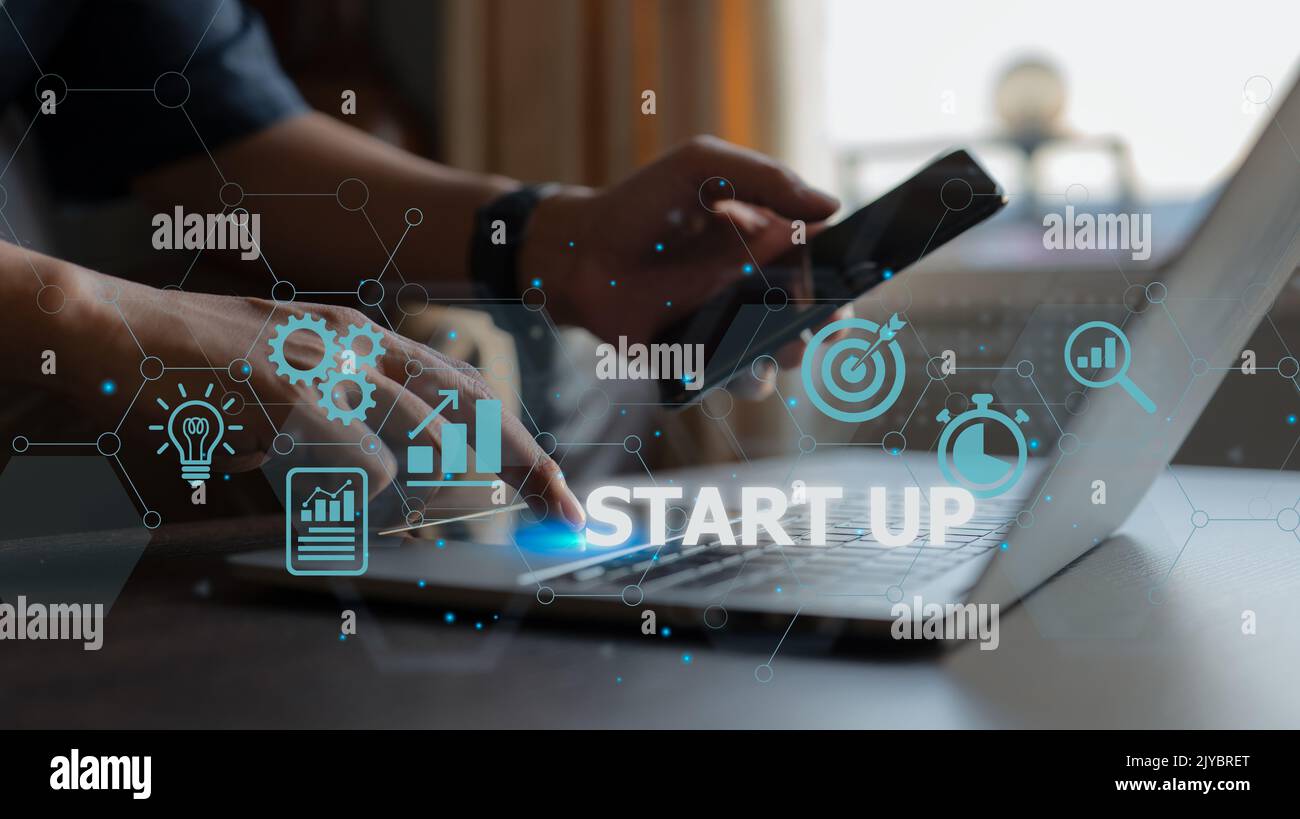 Start-up concept with icons for business and network connection on a ...