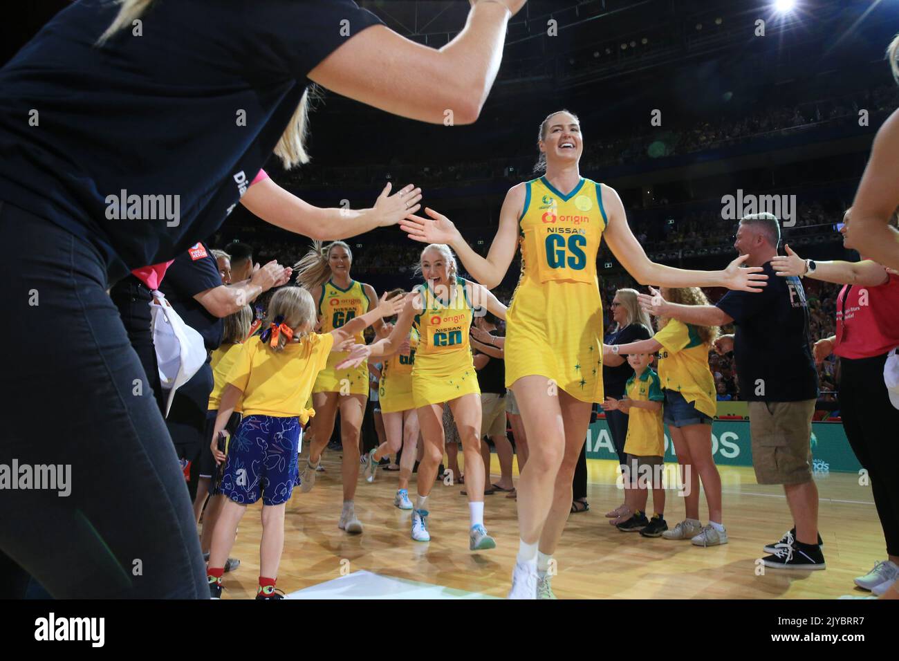 The Diamonds arrive on court during the Bushfire Relief Charity netball ...