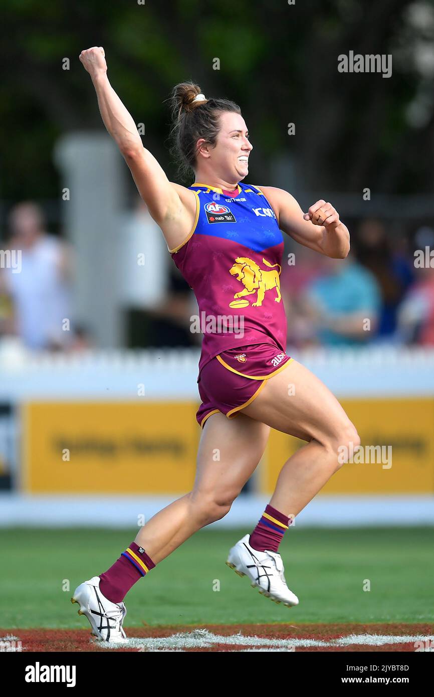 Catherine Svarc of the Lions celebrates kicking a goal during the round ...