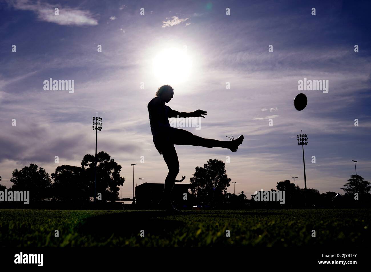 Chris Mayne of the Magpies kicks the ball during the AFL Marsh ...
