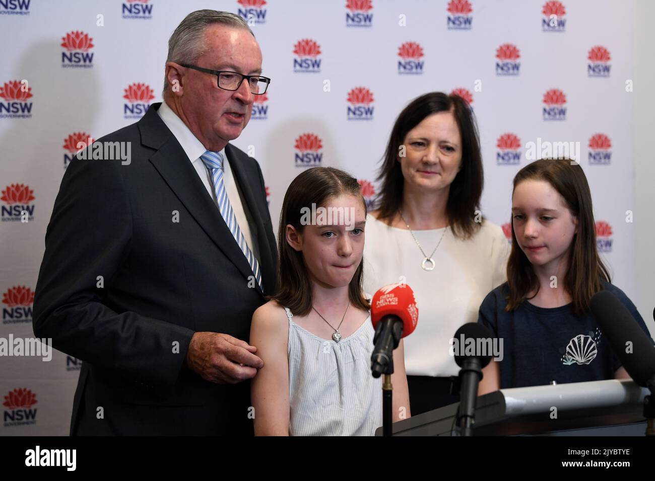 (L-R) Health Minister Brad Hazzard, 10-year-old Rosie Baxter, mother ...