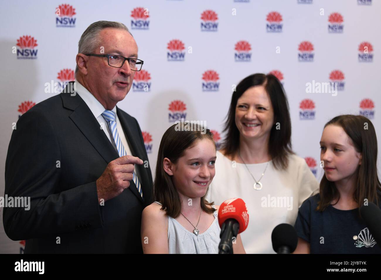 (L-R) Health Minister Brad Hazzard, 10-year-old Rosie Baxter, mother ...