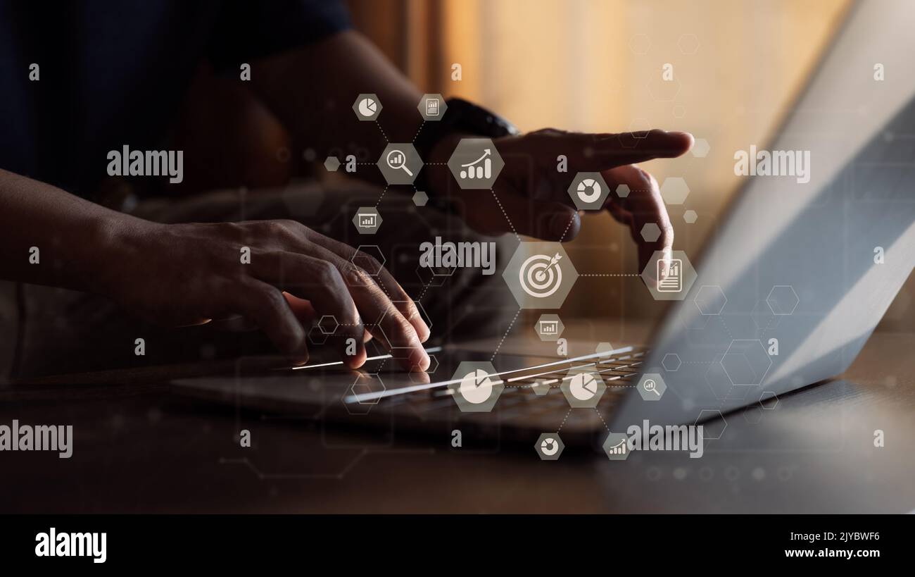 The concept of a businessman using a laptop, analytics, financial and ...
