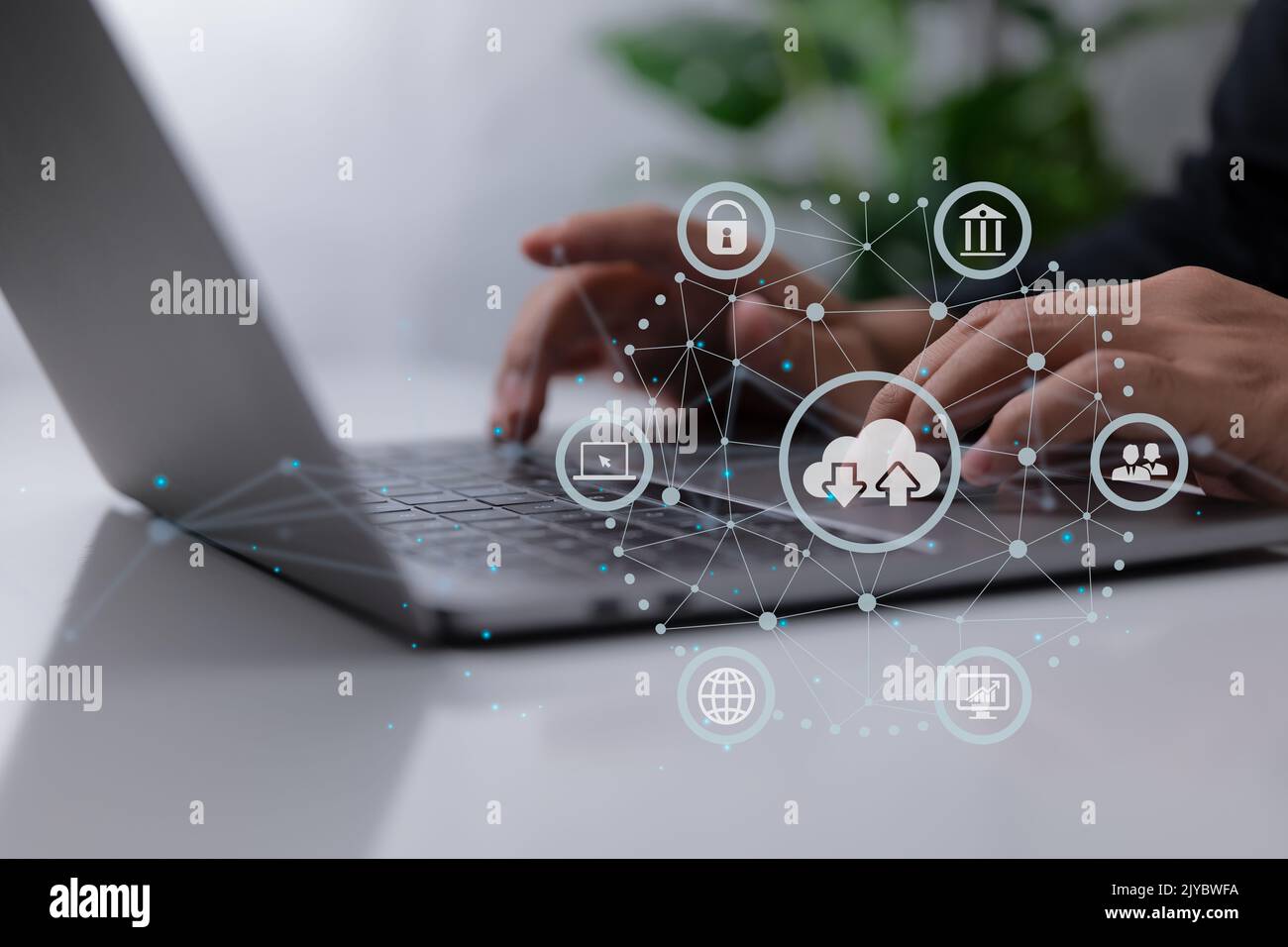 Man Uses A Laptop With A Cloud Computing Schematic Cloud Computing Is A Type Of Technology That