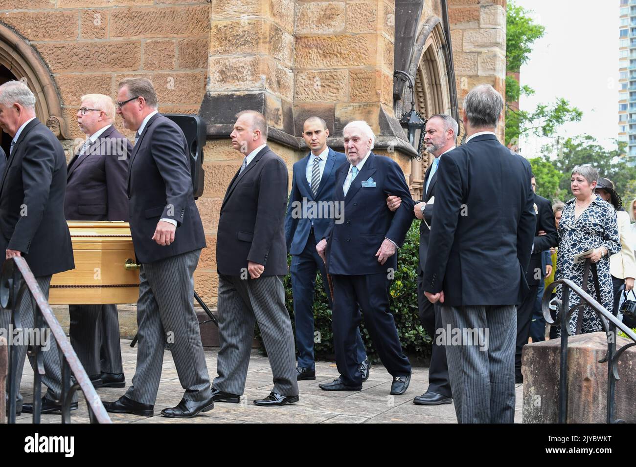 The casket of Caroline Laws is carried into a hearse as John Laws ...