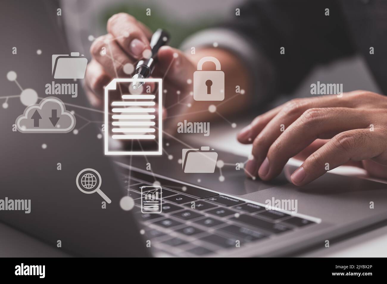 On a laptop computer in the workplace, an IT expert is setting up a ...