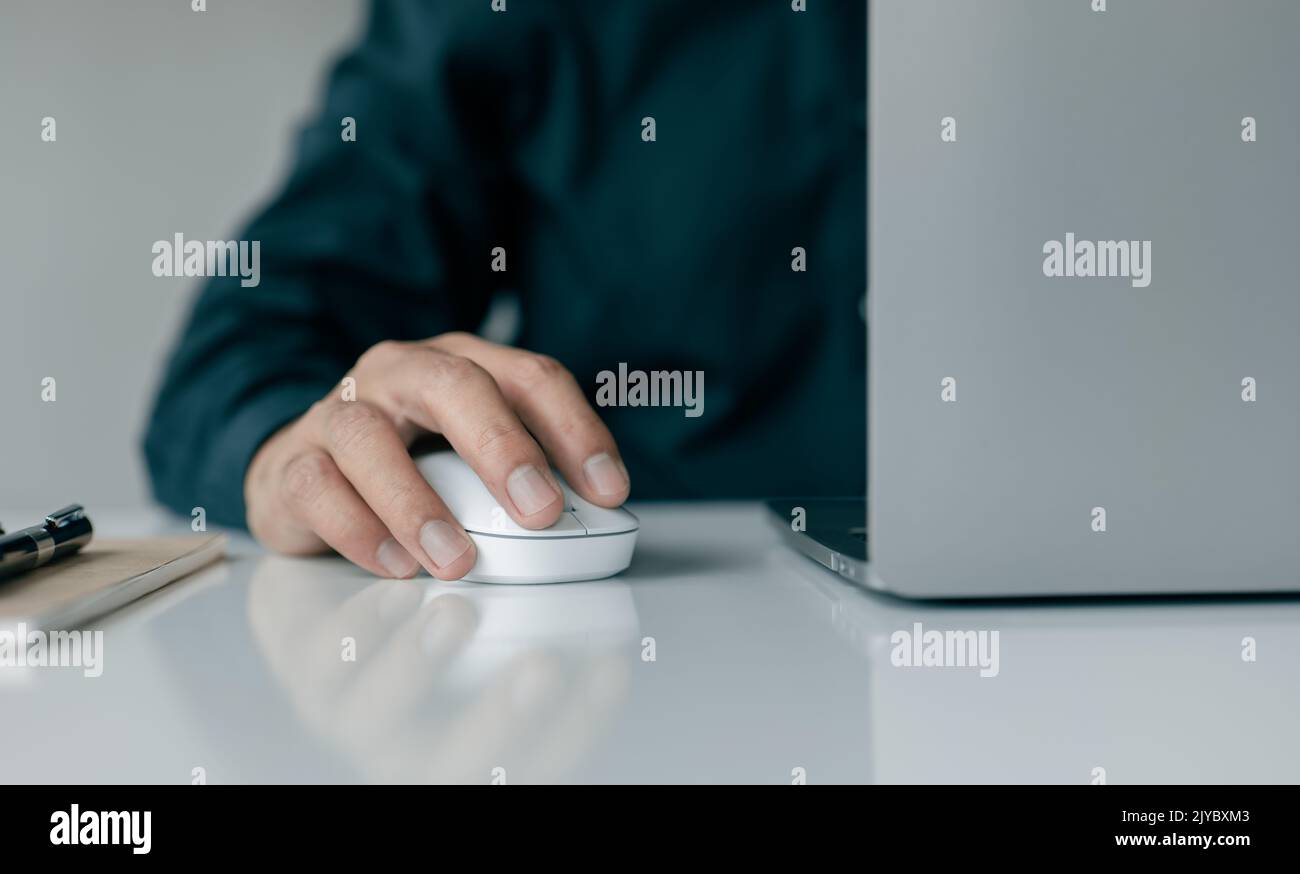 Hand types on laptop keyboard hi-res stock photography and images - Alamy