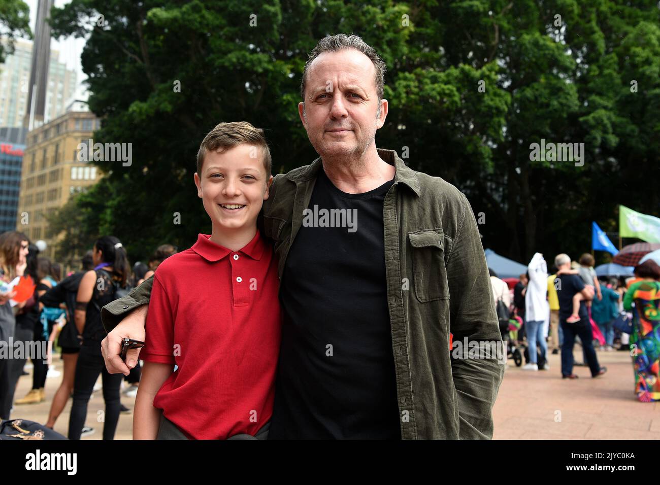 Father and son Rafie Read-Box, 12, and Paul Box pose for a photograph ...