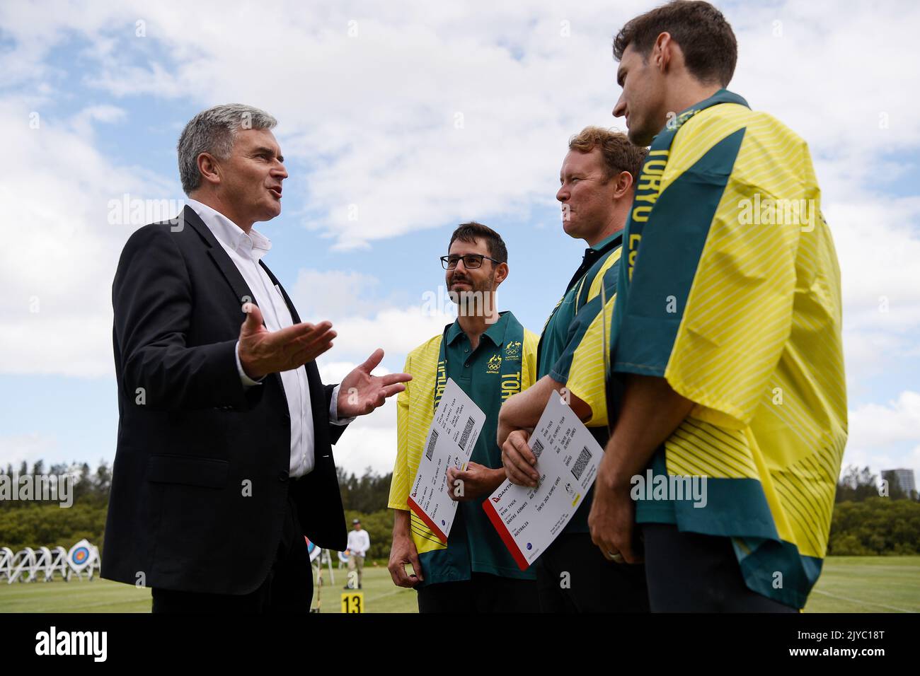 (L-R) Australian Olympic Chef de Mission Ian Chesterman and archers ...