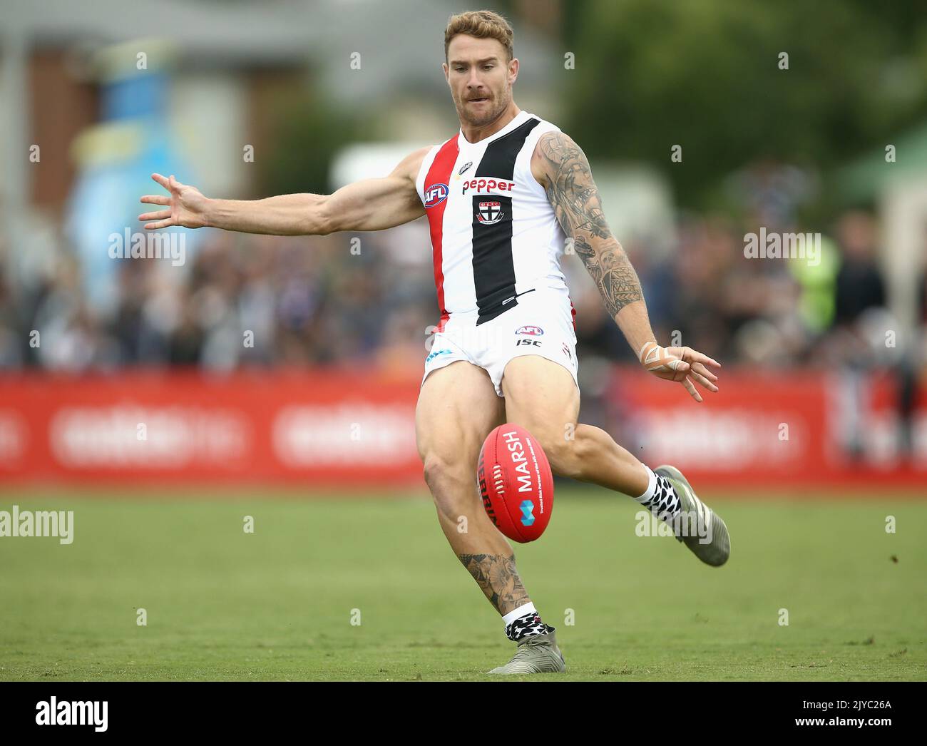 Dean Kent of the St Kilda Saints kicks during the AFL Marsh Community ...