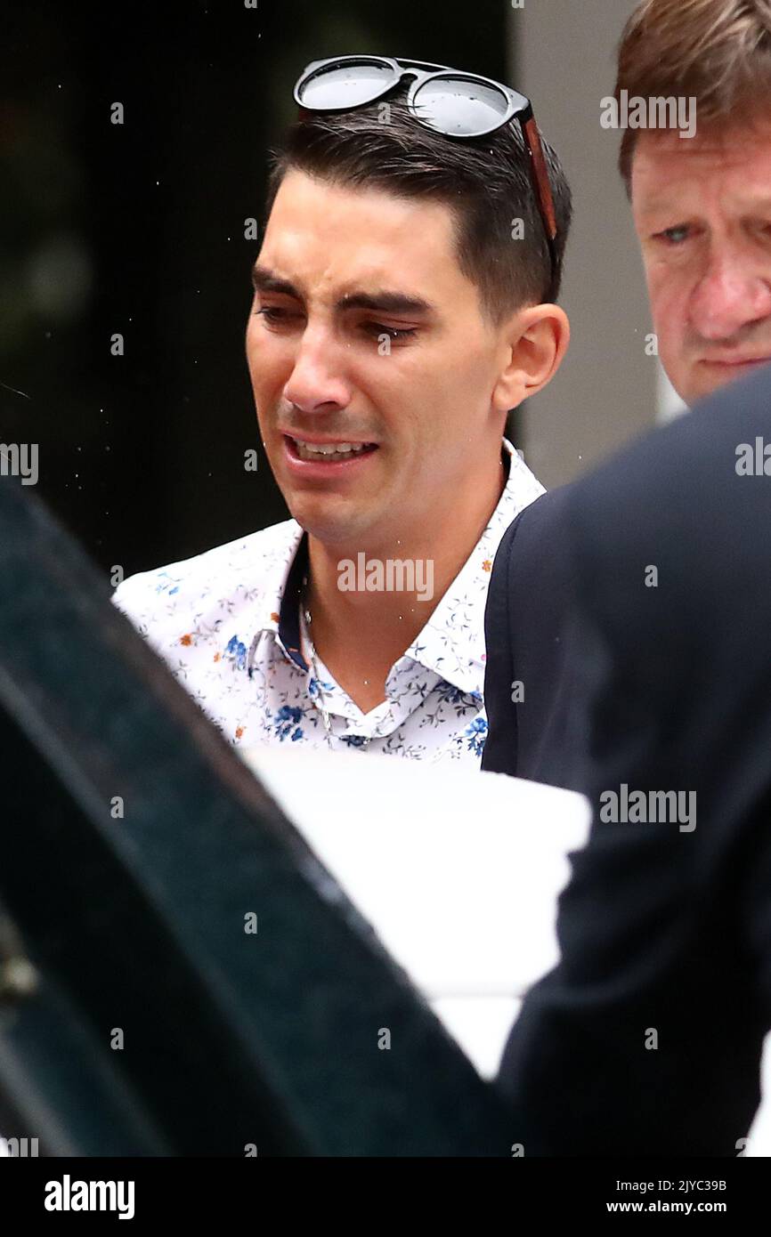 Nathaniel Clarke, brother to Hannah Clarke, looks on as the coffin is ...