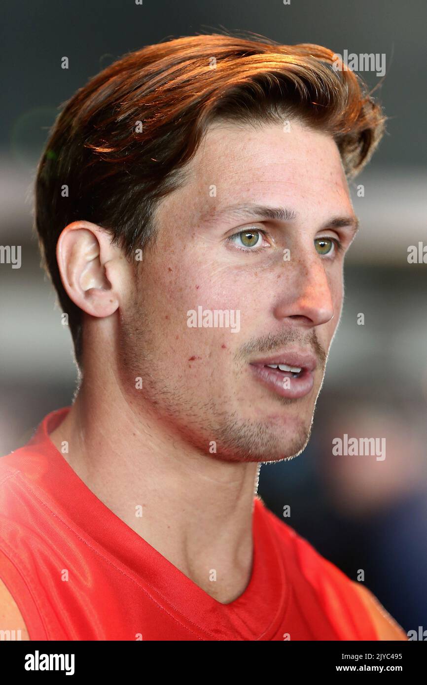 David Swallow of the Suns speaks to media during an AFL Club Captains ...