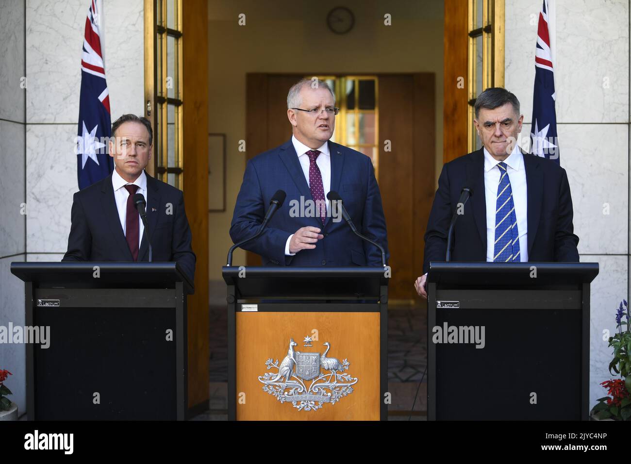 (L-R) Australian Health Minister Greg Hunt, Australian Prime Minister ...
