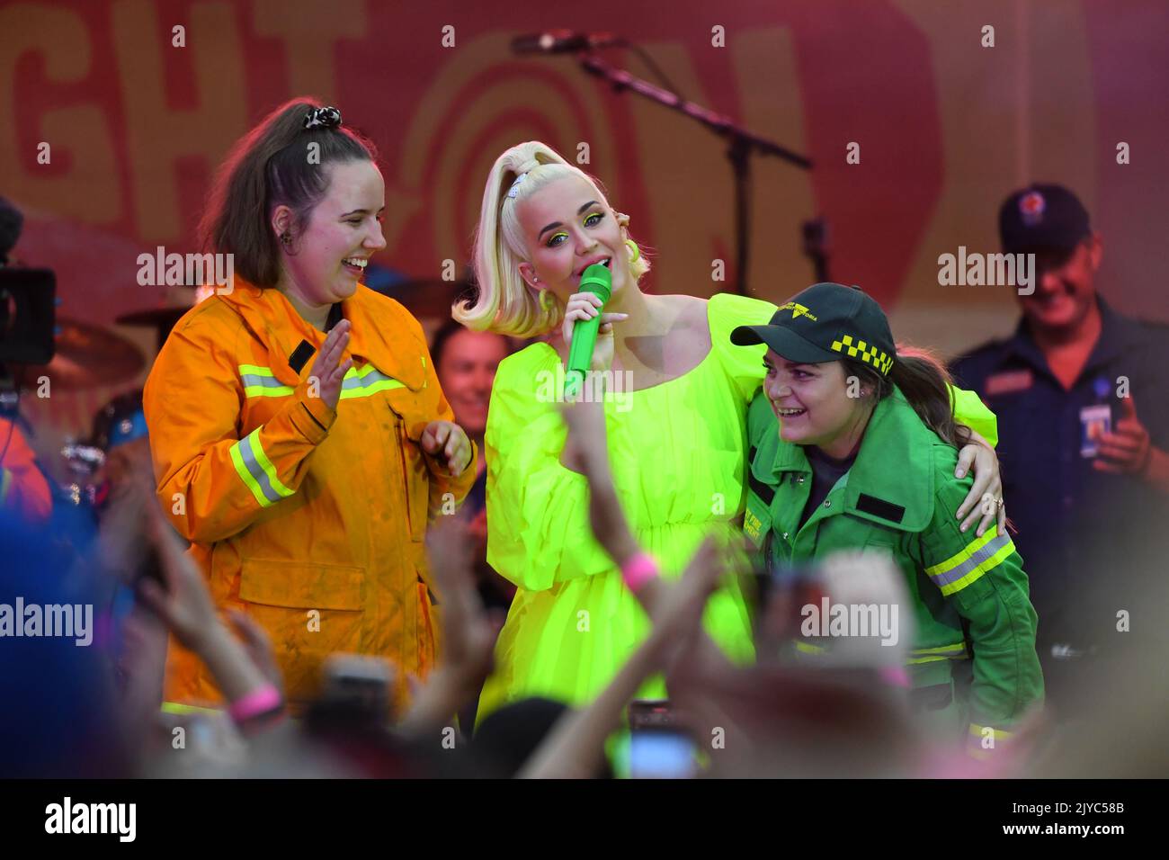 American singer Katy Perry (centre) performs with CFA and a Victorian ...