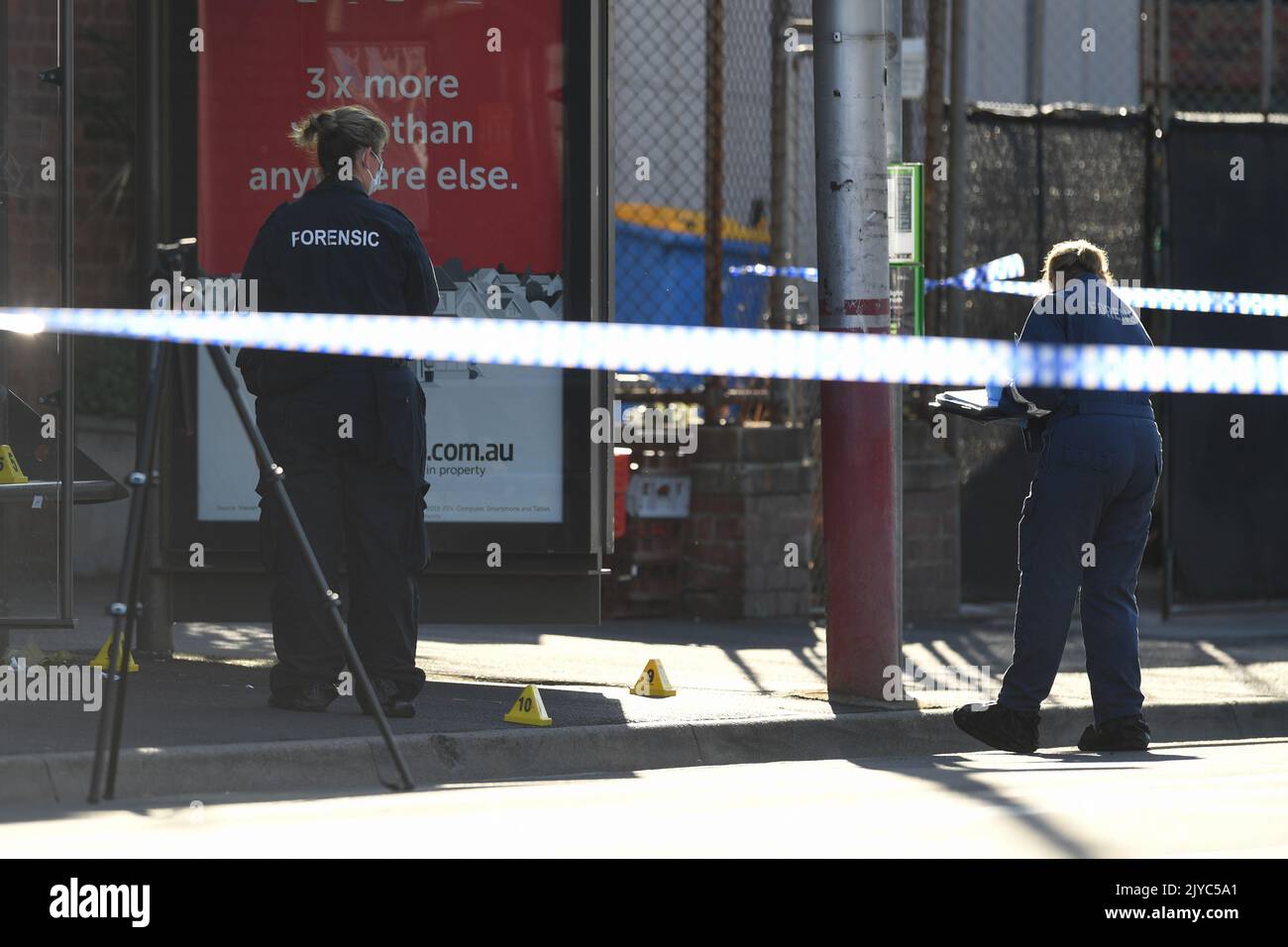 Forensic police work at the scene of a stabbing in Kew, Melbourne ...