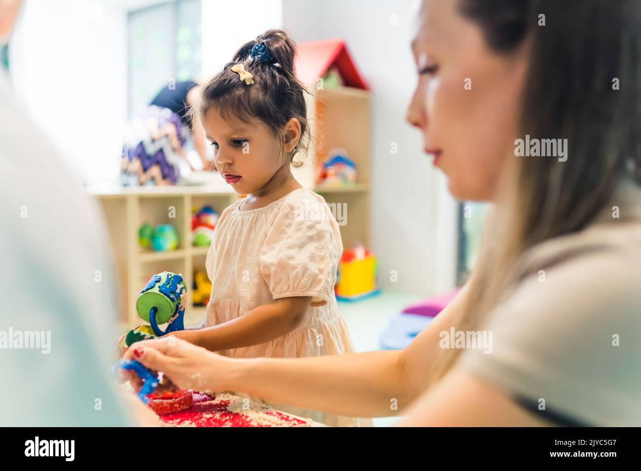 Boy girl play kinetic hi-res stock photography and images - Alamy