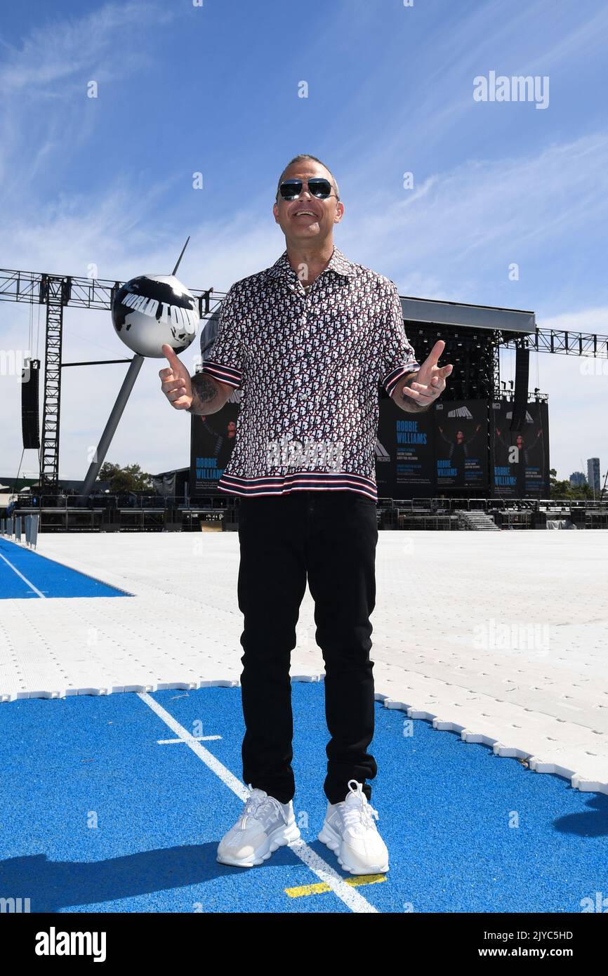 English singer Robbie Williams poses for a photograph ahead of his ...