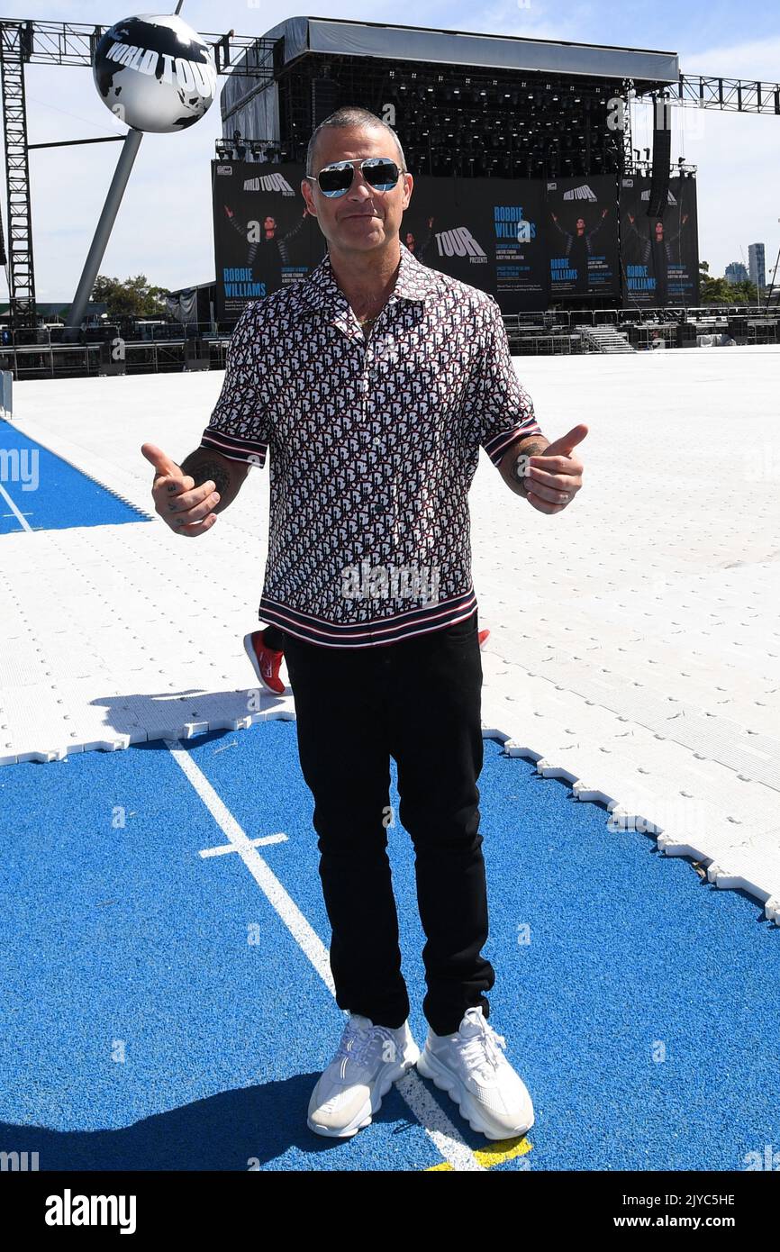 English singer Robbie Williams poses for a photograph ahead of his ...