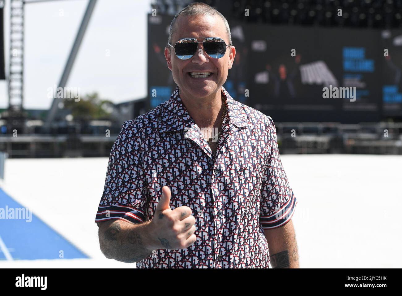 English singer Robbie Williams poses for a photograph ahead of his ...