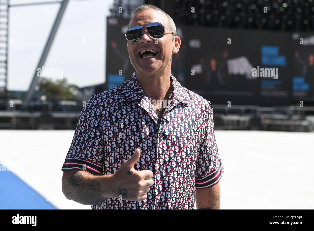 English singer Robbie Williams poses for a photograph ahead of his ...
