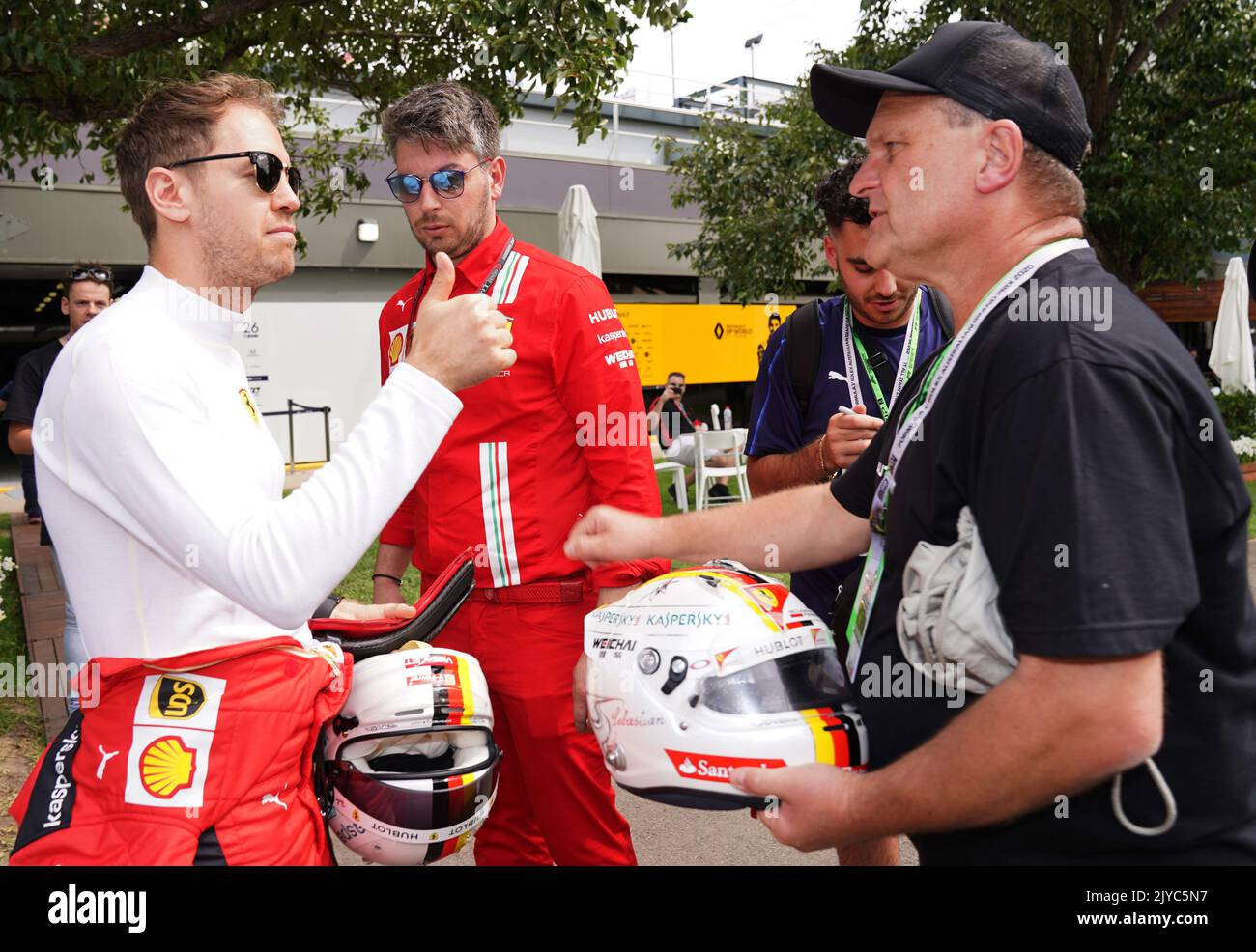 Sebastian Vettel of Ferrari mixes with fans ahead of the Formula 1 ...