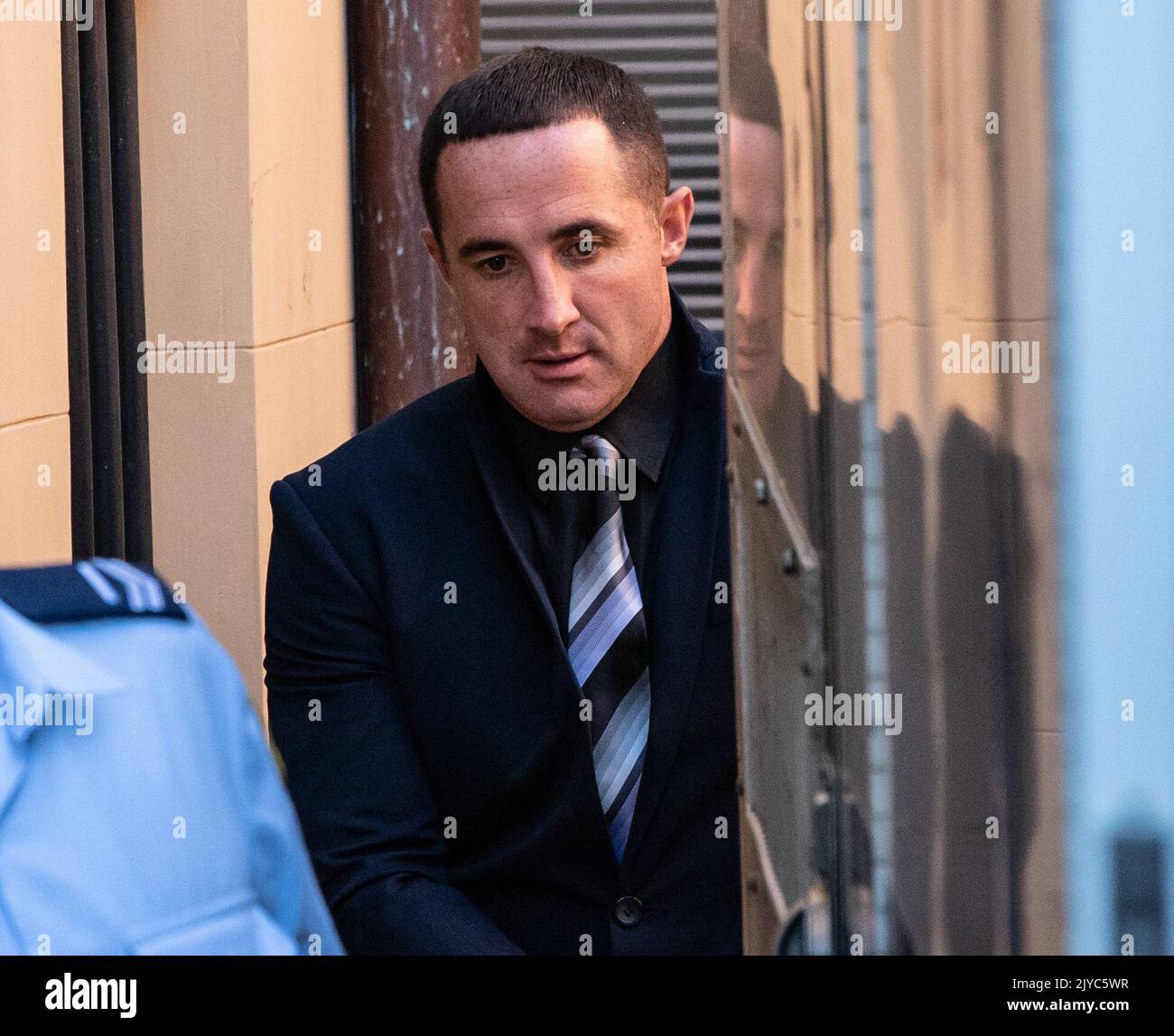 Ryan Paterson is escorted to a Corrective Services prison transport ...
