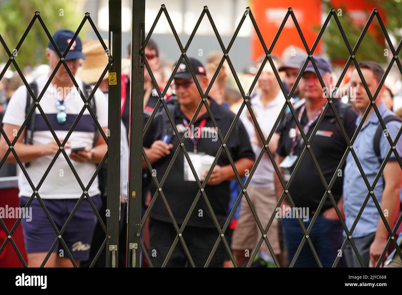 Spectators queue at the gate to gain entry ahead of the Formula 1 ...