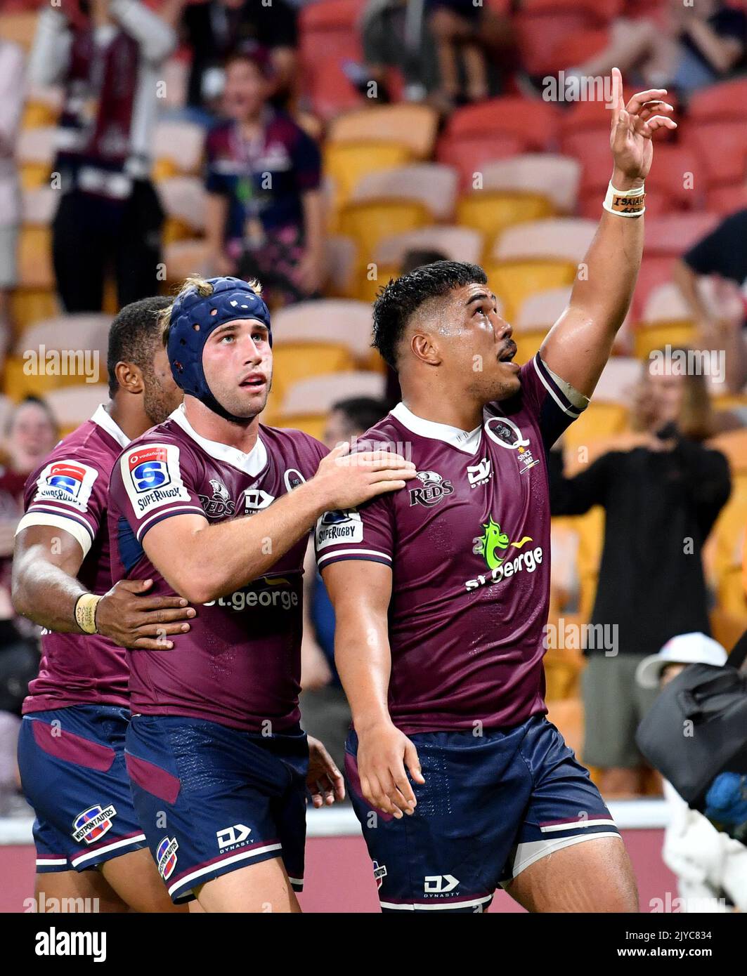 Alex Mafi (right) of the Reds celebrates scoring a try during the Round ...