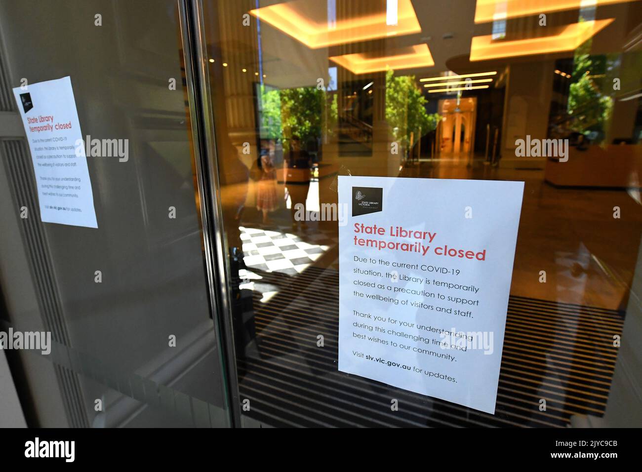 Signage explaining the temporary closure of the State Library of ...