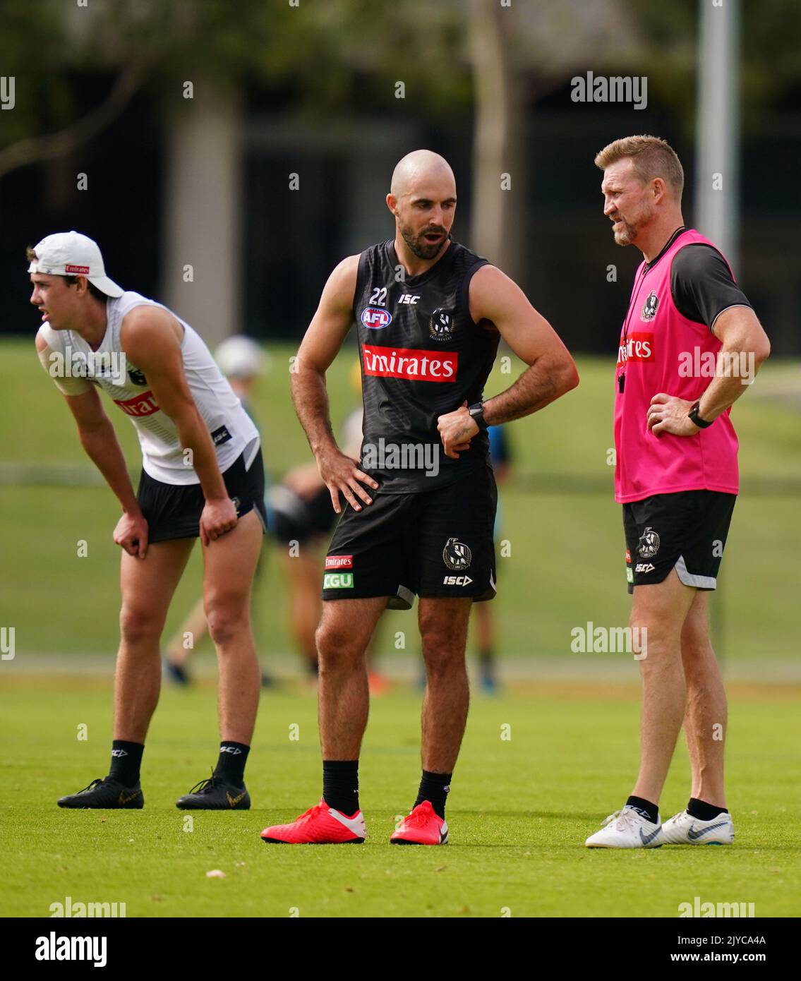 Steele Sidebottom talks with Nathan Buckley, coach of the Magpies as ...