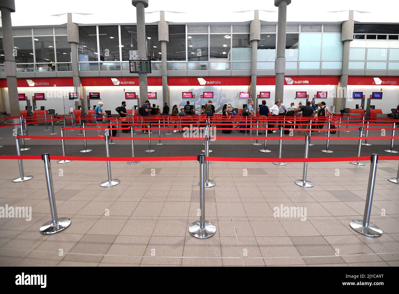 A near empty Virgin Australia check-in area is seen at Brisbane Airport ...