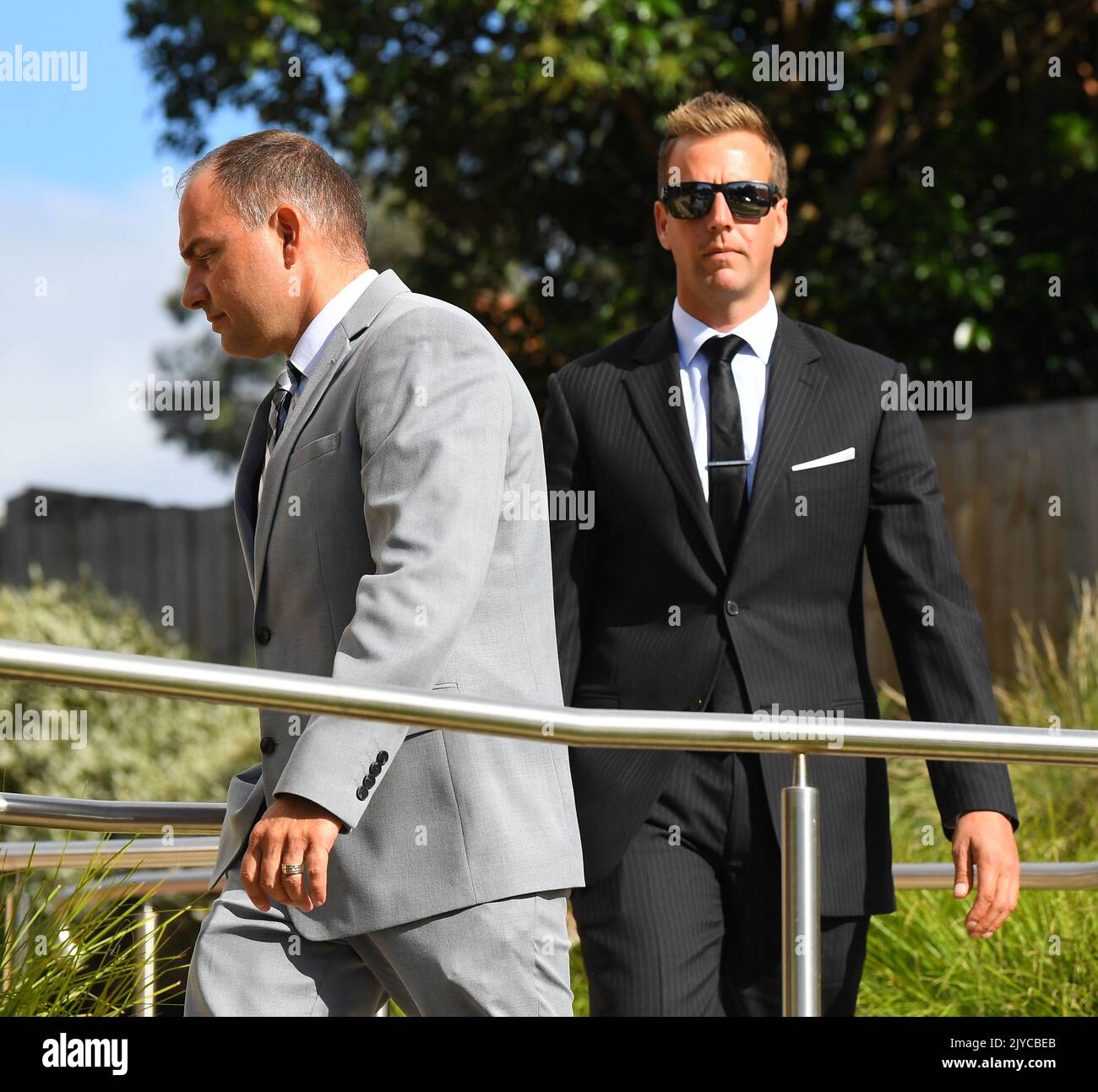 Victoria Police officers Brad McLeod (right) and Florian Hilgart arrive ...