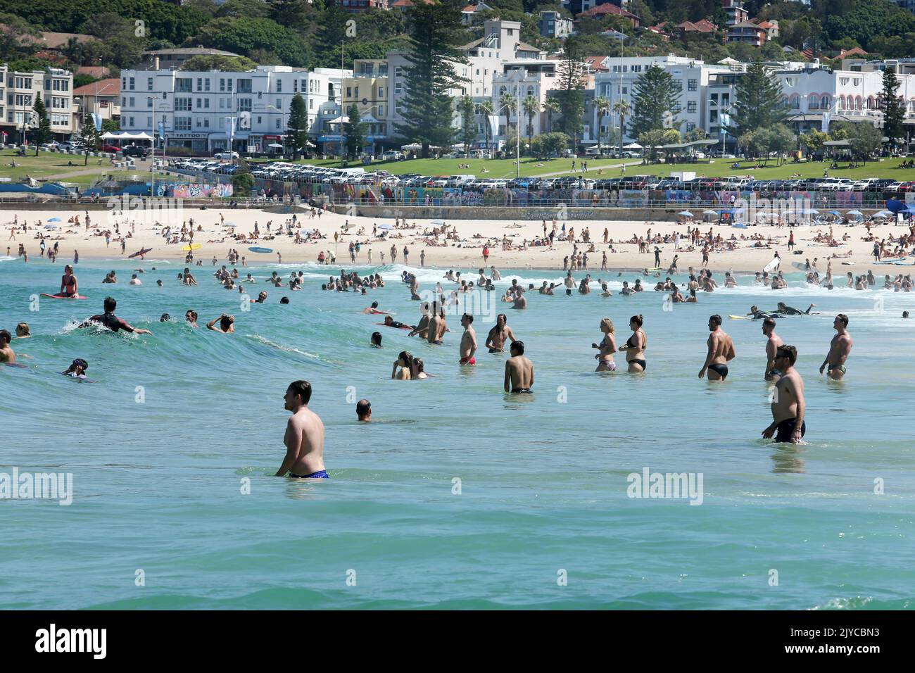 Beachgoers are seen at Bondi Beach despite the threat of Coronavirus ...