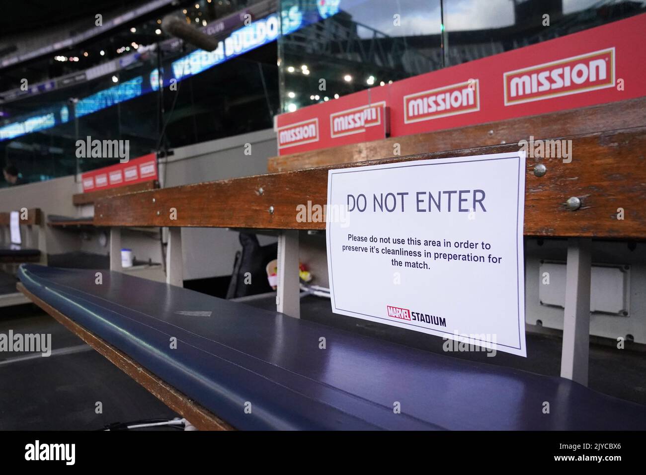 A sign is seen on the bench during the Round 1 AFL match between ...