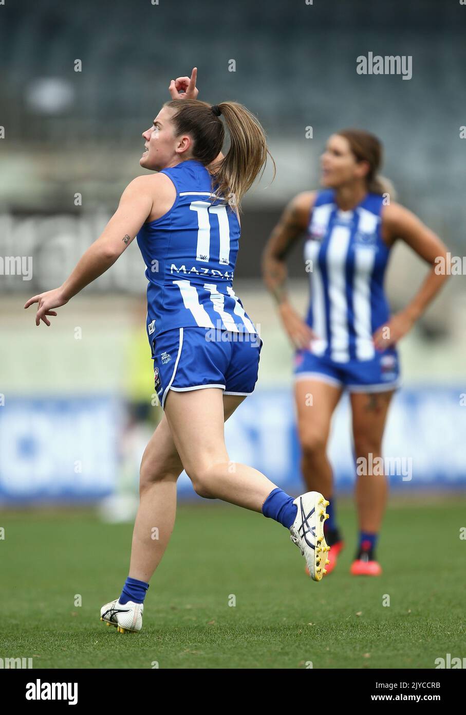 Daisy Bateman of the North Melbourne Kangaroos celebrates a goal during ...