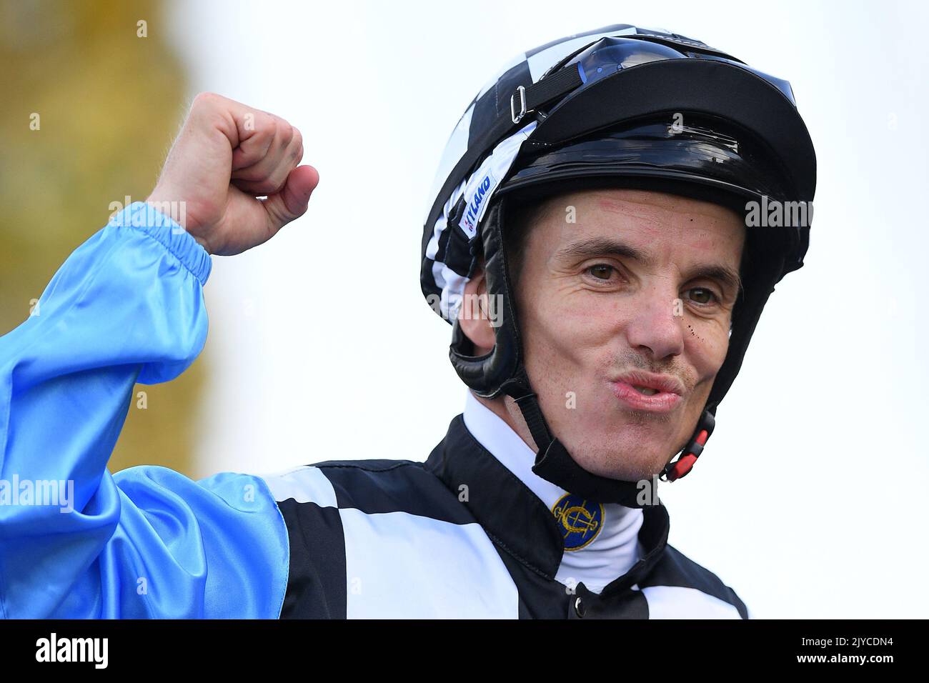 Jockey Tim Clark returns to the mounting yard after riding I Am Excited ...