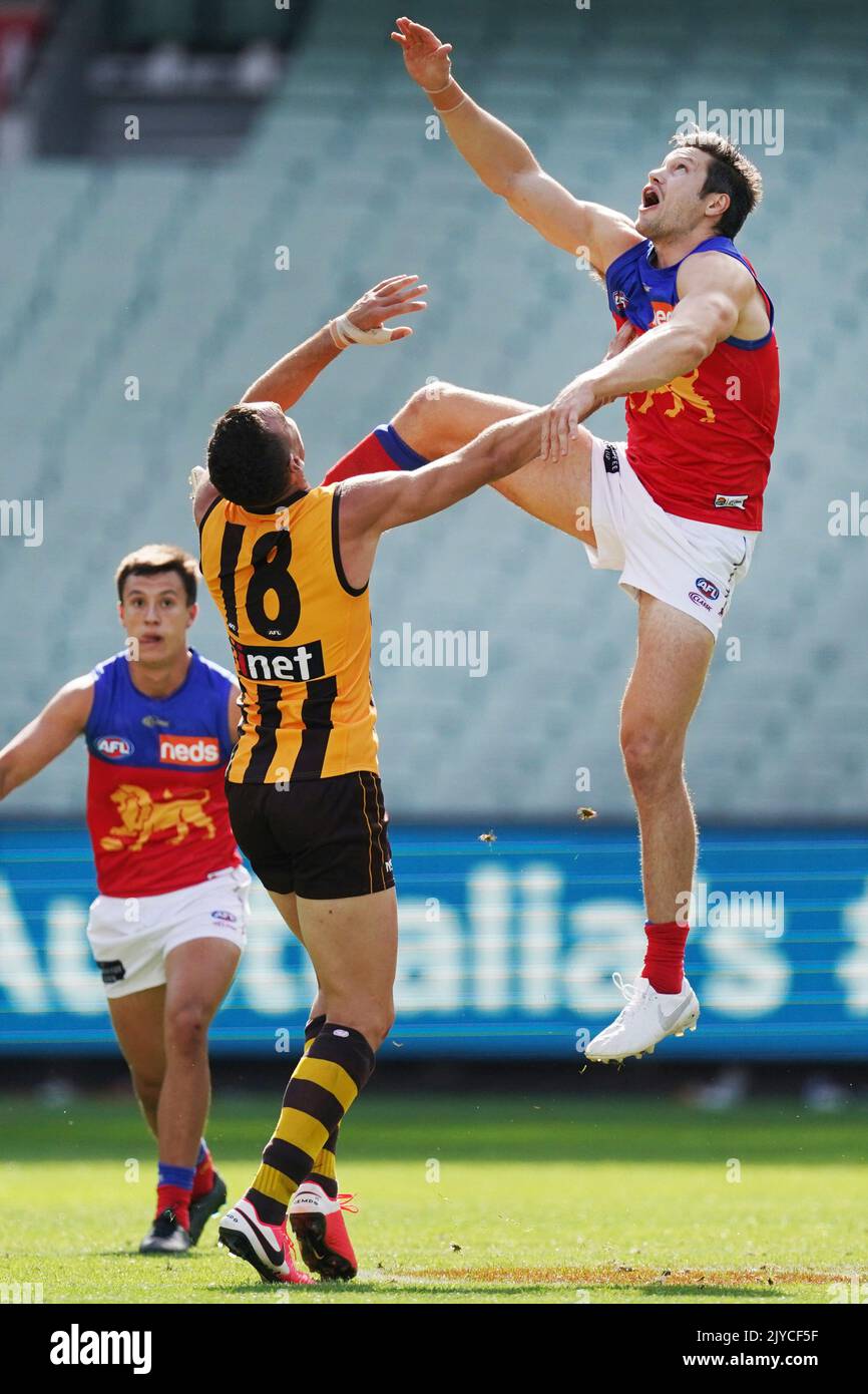 Stefan Martin of the Lions competes for the ball against Jonathon ...
