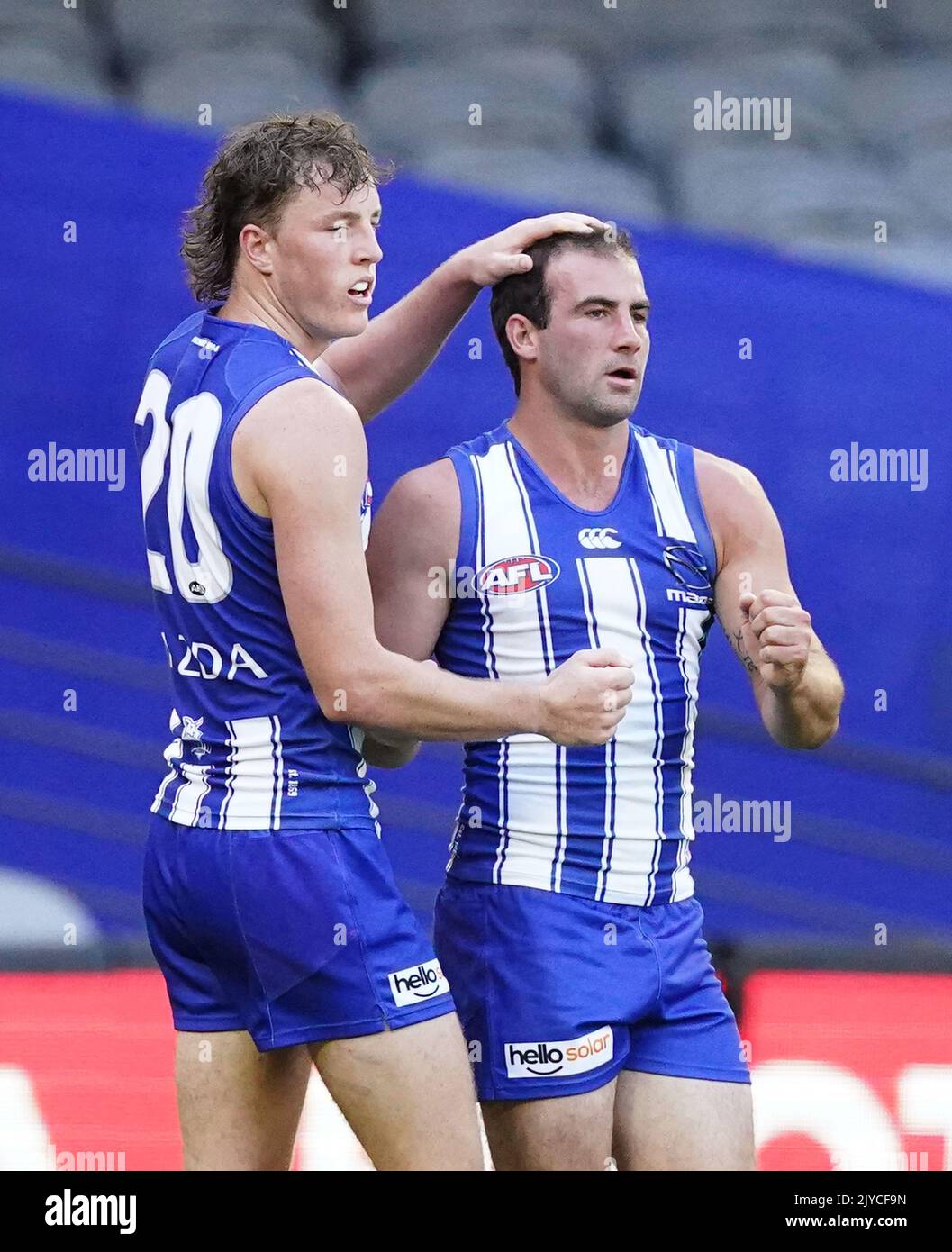 Ben Cunnington of the Kangaroos celebrates after kicking a goal with ...