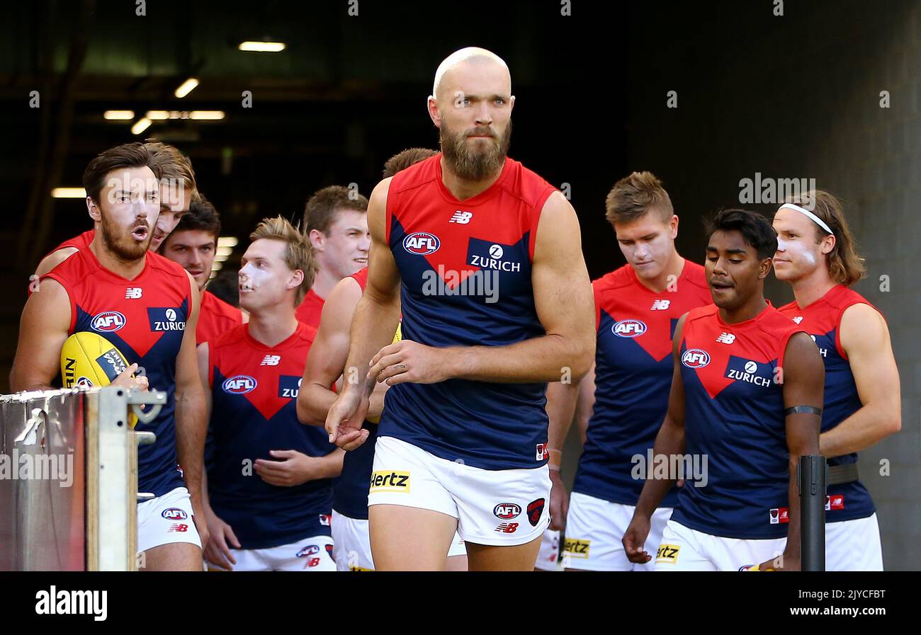 Max Gawn of the Demons leads out the team during the Round 1 AFL match ...