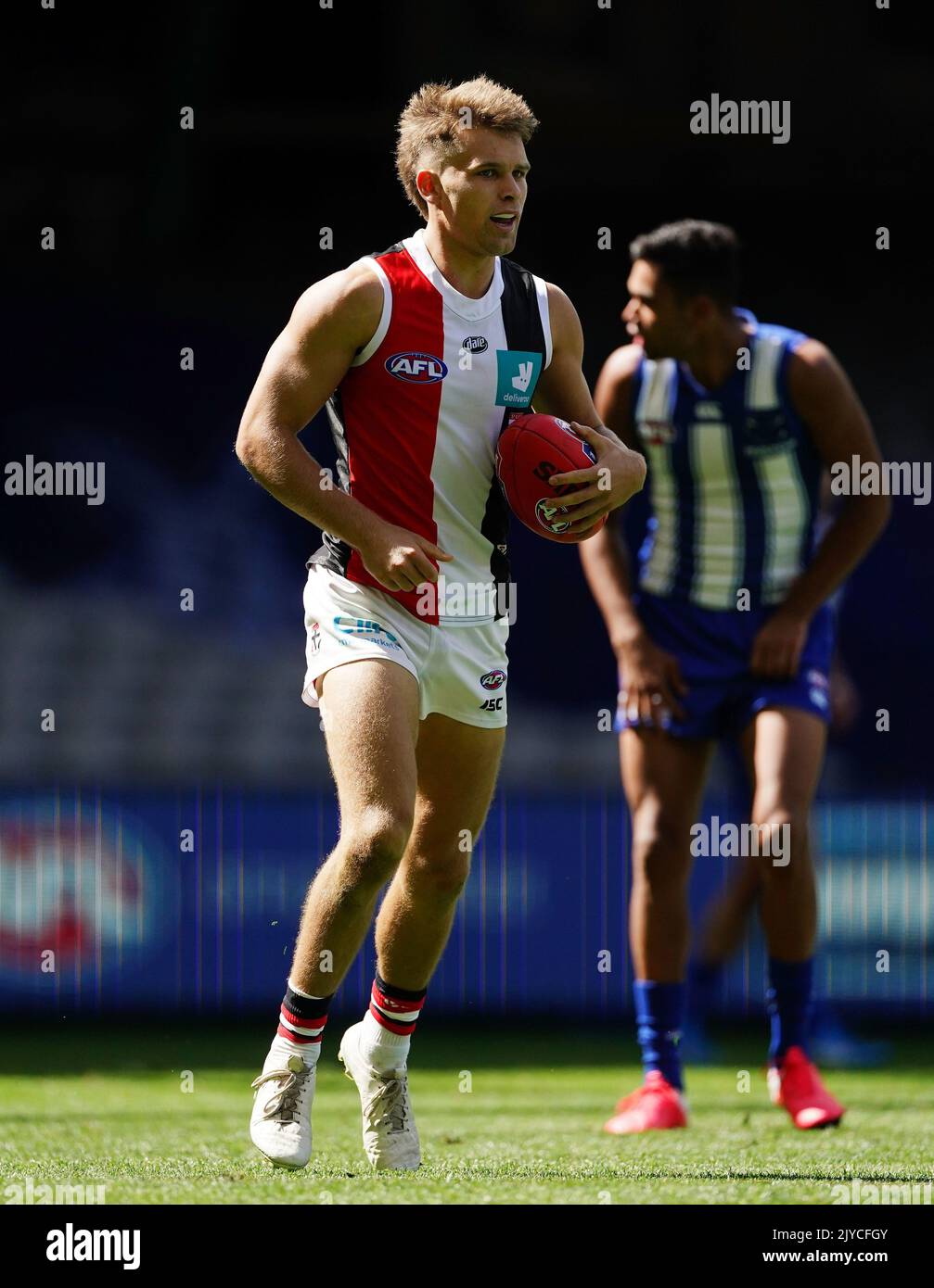 Dan Butler of the Saints runs with the ball during the Round 1 AFL ...