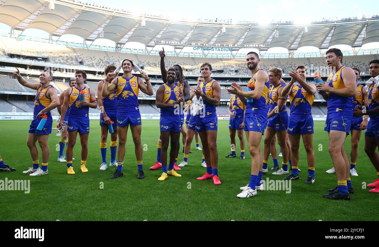 The Eagles players gather after the Round 1 AFL match between the West ...