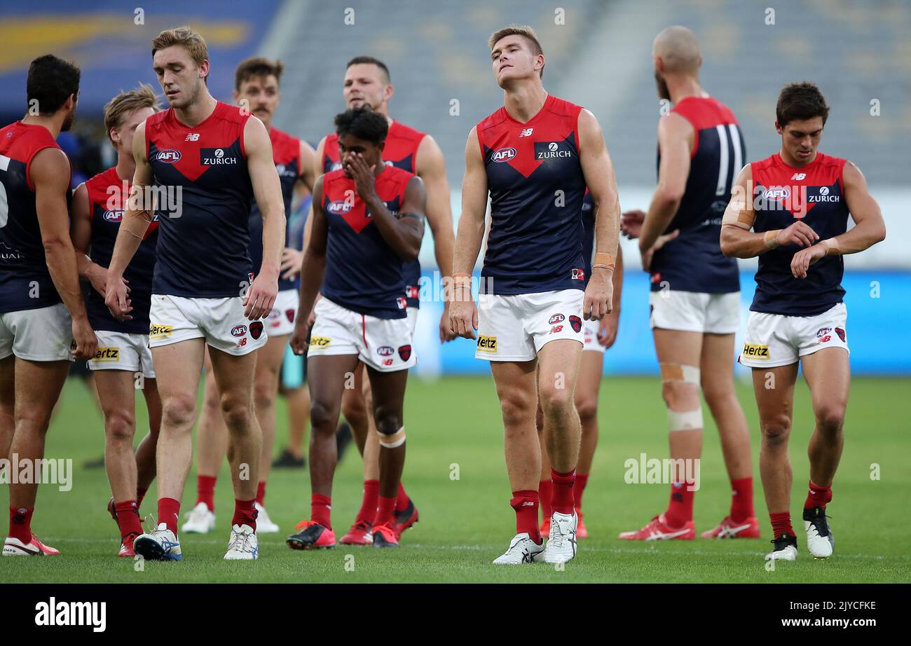 The Demons players react at the end of the game after the Round 1 AFL ...